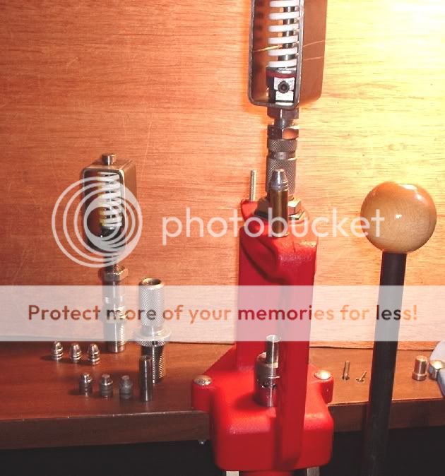 Automatic bullet swager die ejector up date