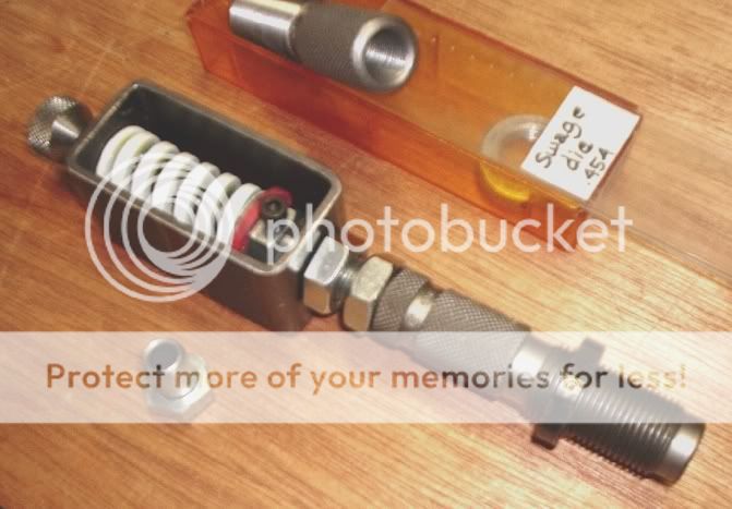 Automatic bullet swager die ejector up date