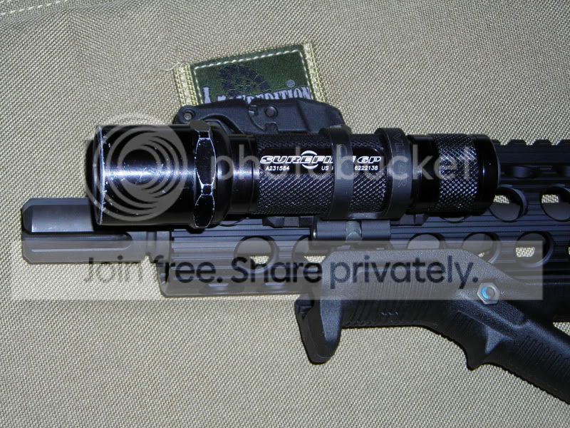 Fake and if so, any idea who made it? Vortex flash hider related ...